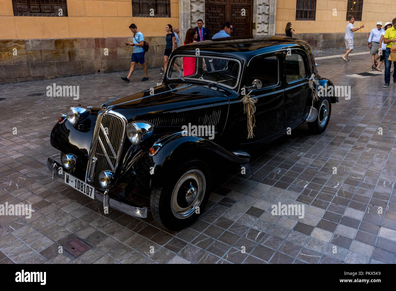 Malaga, Spain - June 24: A classic ford sedan car is being decorated ...