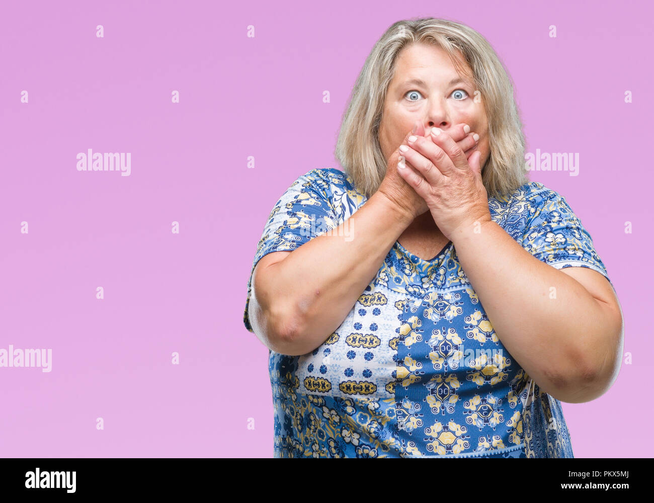 Senior plus size caucasian woman over isolated background shocked ...