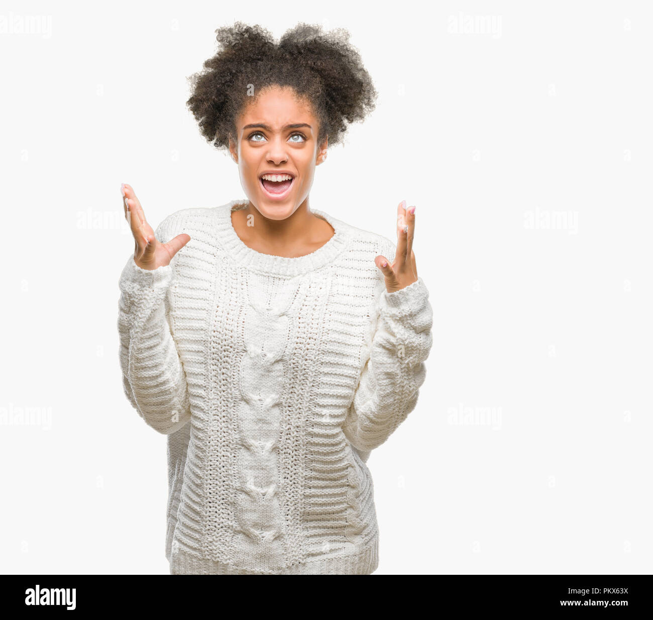 Young afro american woman wearing winter sweater over isolated ...