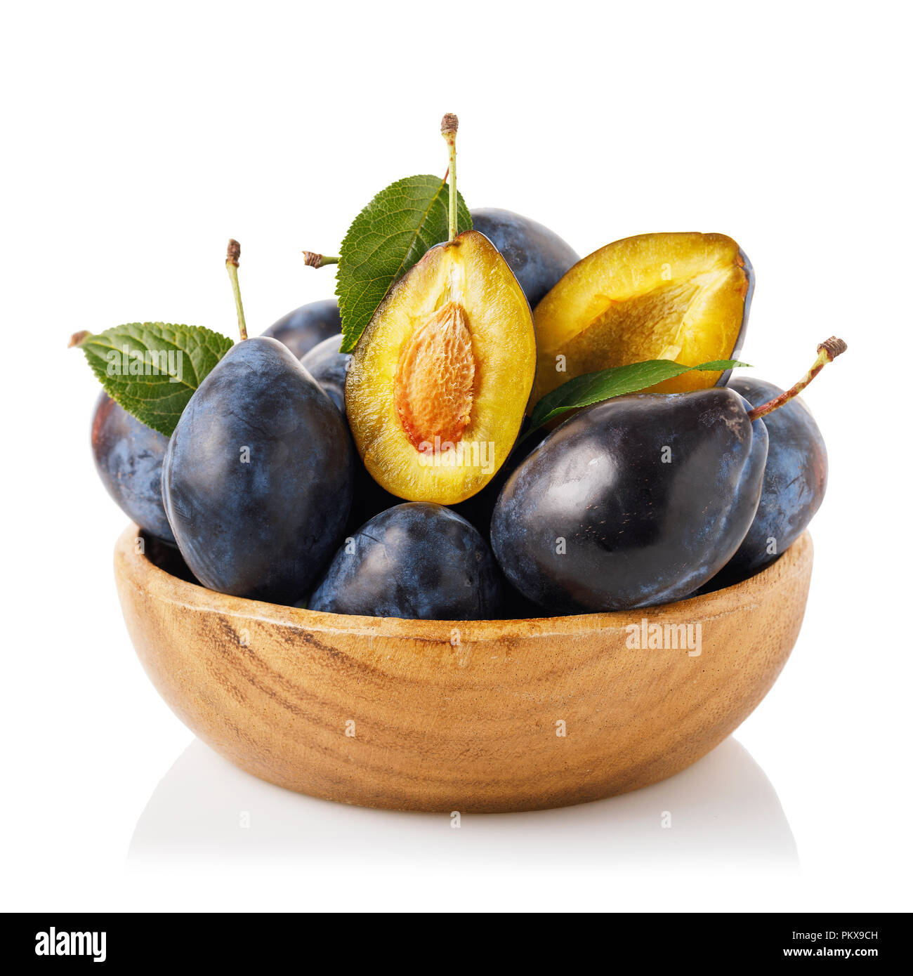Cup full of ripe prunes. Fruits isolated on white background Stock ...
