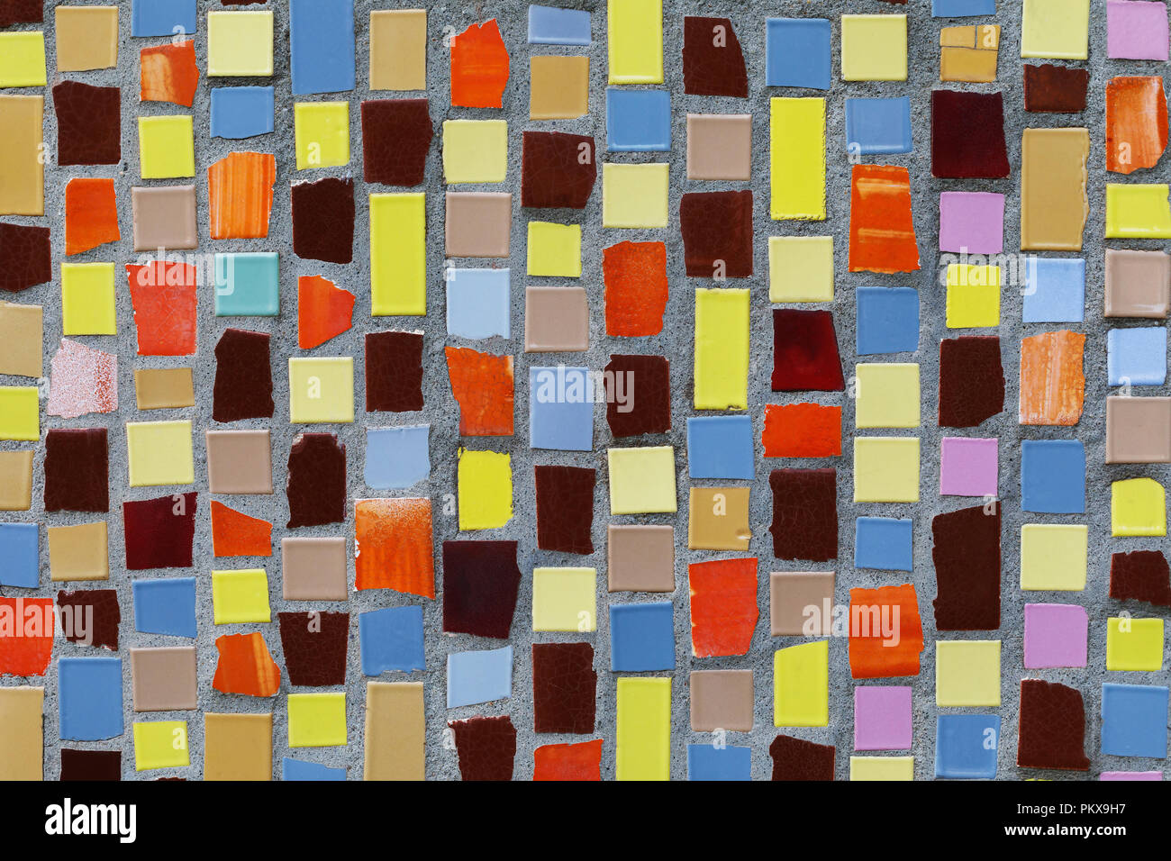 Texture of small ceramic tiles of various shapes and colors. Background ...