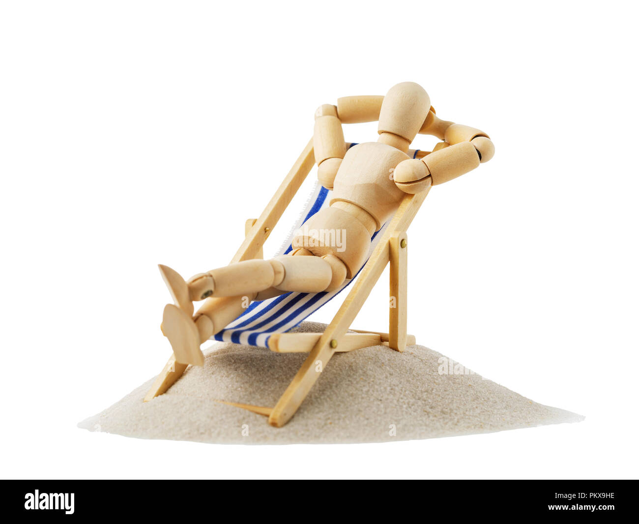 Wooden figure in the form of a man resting on a deckchair. Gestalta ...