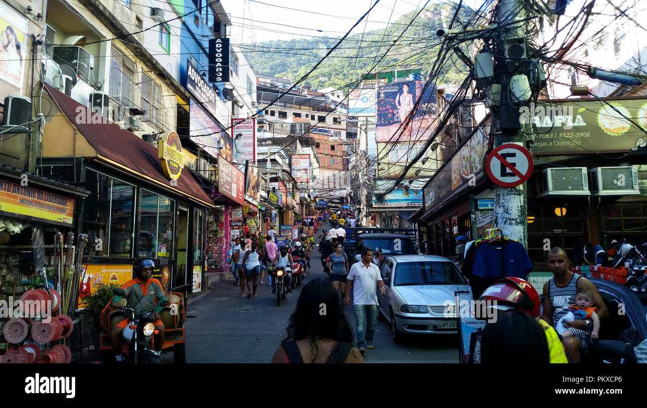 Rocinha community, lots of people, lots of houses, shops. Rio de ...