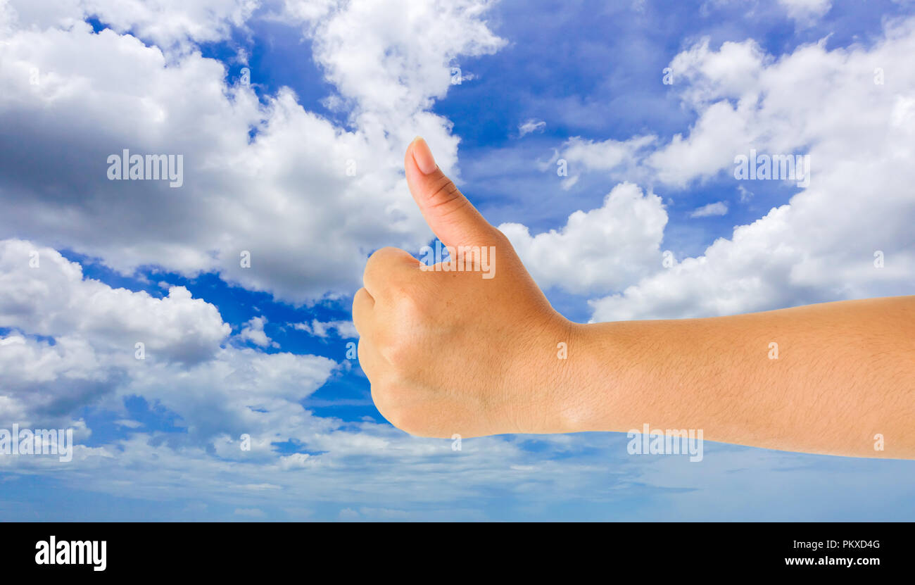 human hand showing gesture with blue sky background Stock Photo - Alamy