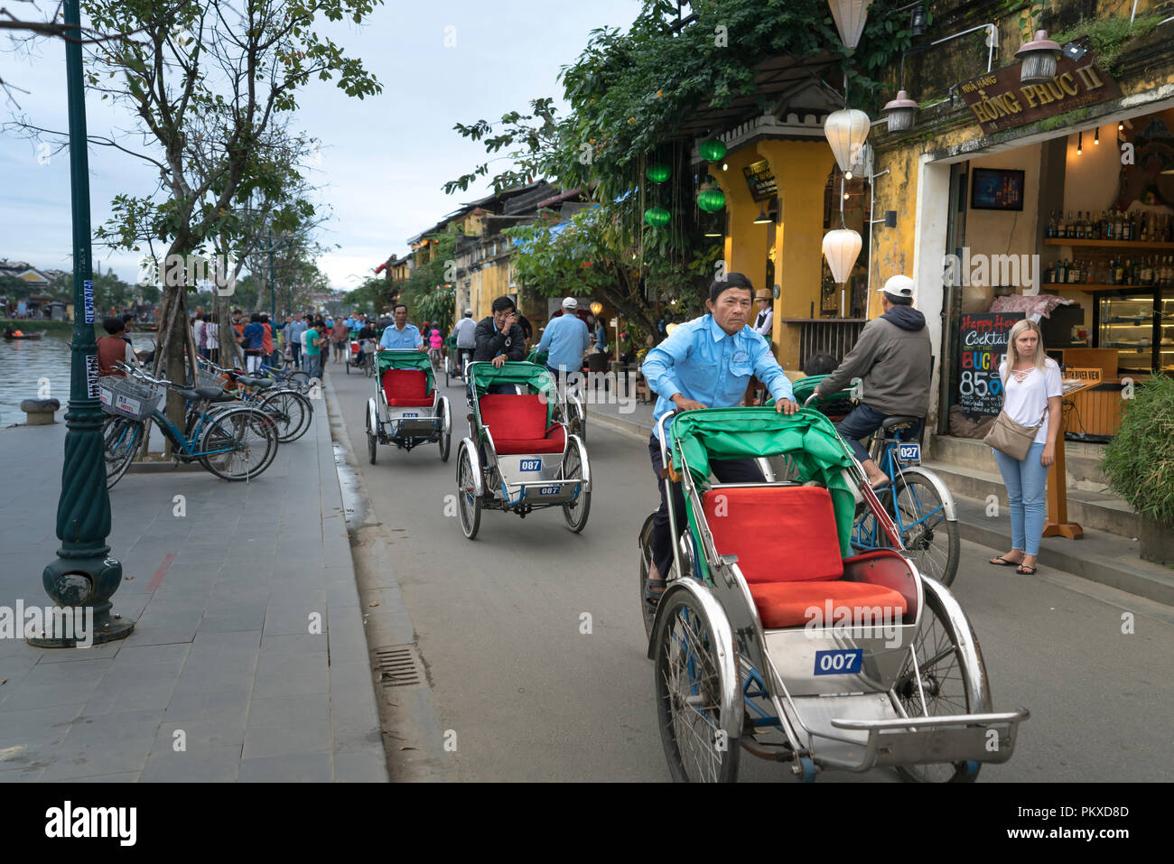 The cyclos in Hoi An. Travelers enjoy when moving by cyclo in Hoi An ...