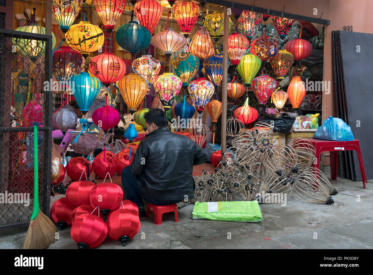 A man is making his own craft lantern is very beautiful to sell to ...