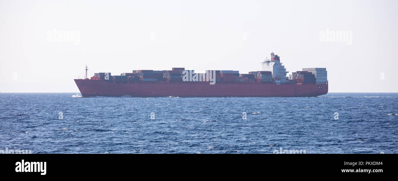 Container ship for international transport sail full of cargo. Sea ...