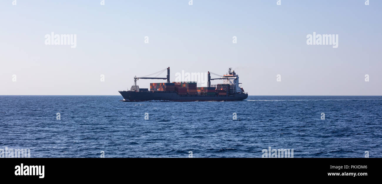 Container ship for international transport sail full of cargo. Sea ...