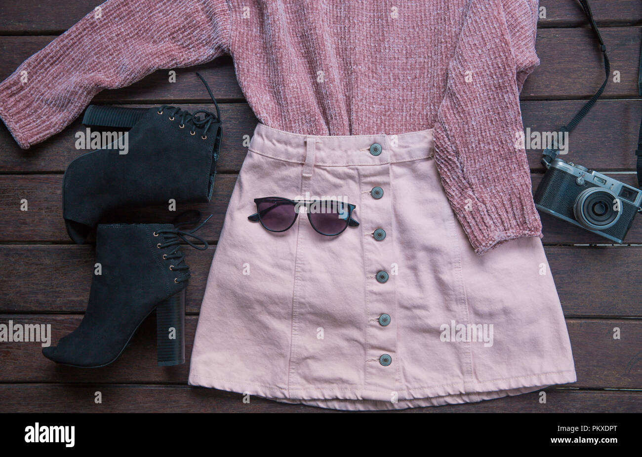 Autumn female outfit. Set of clothes, shoes and accessories on brown ...