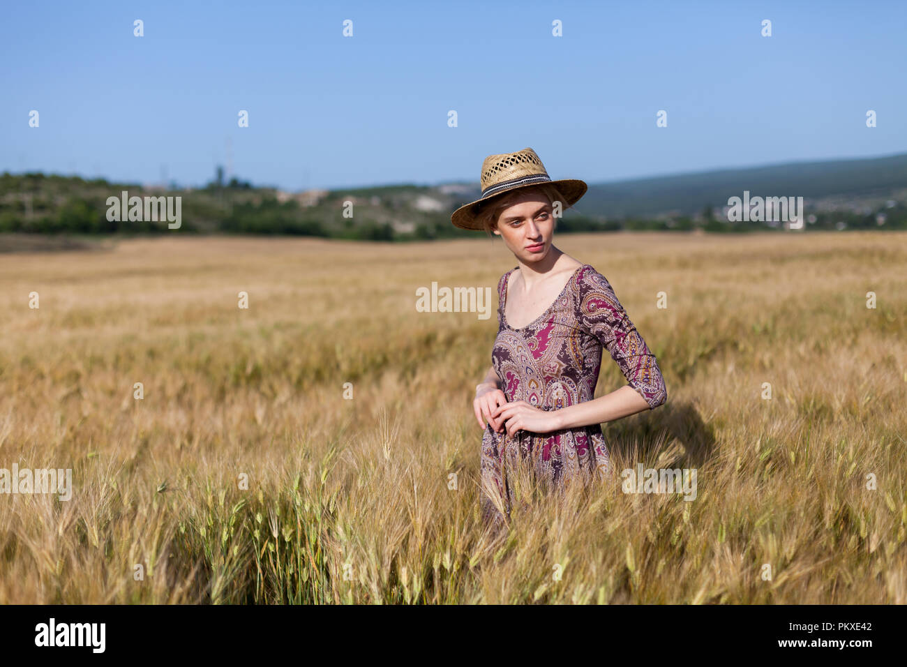 beautiful woman farmer in field of wheat farm Stock Photo - Alamy