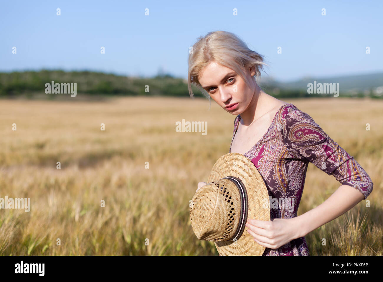 beautiful woman farmer in field of wheat farm Stock Photo - Alamy