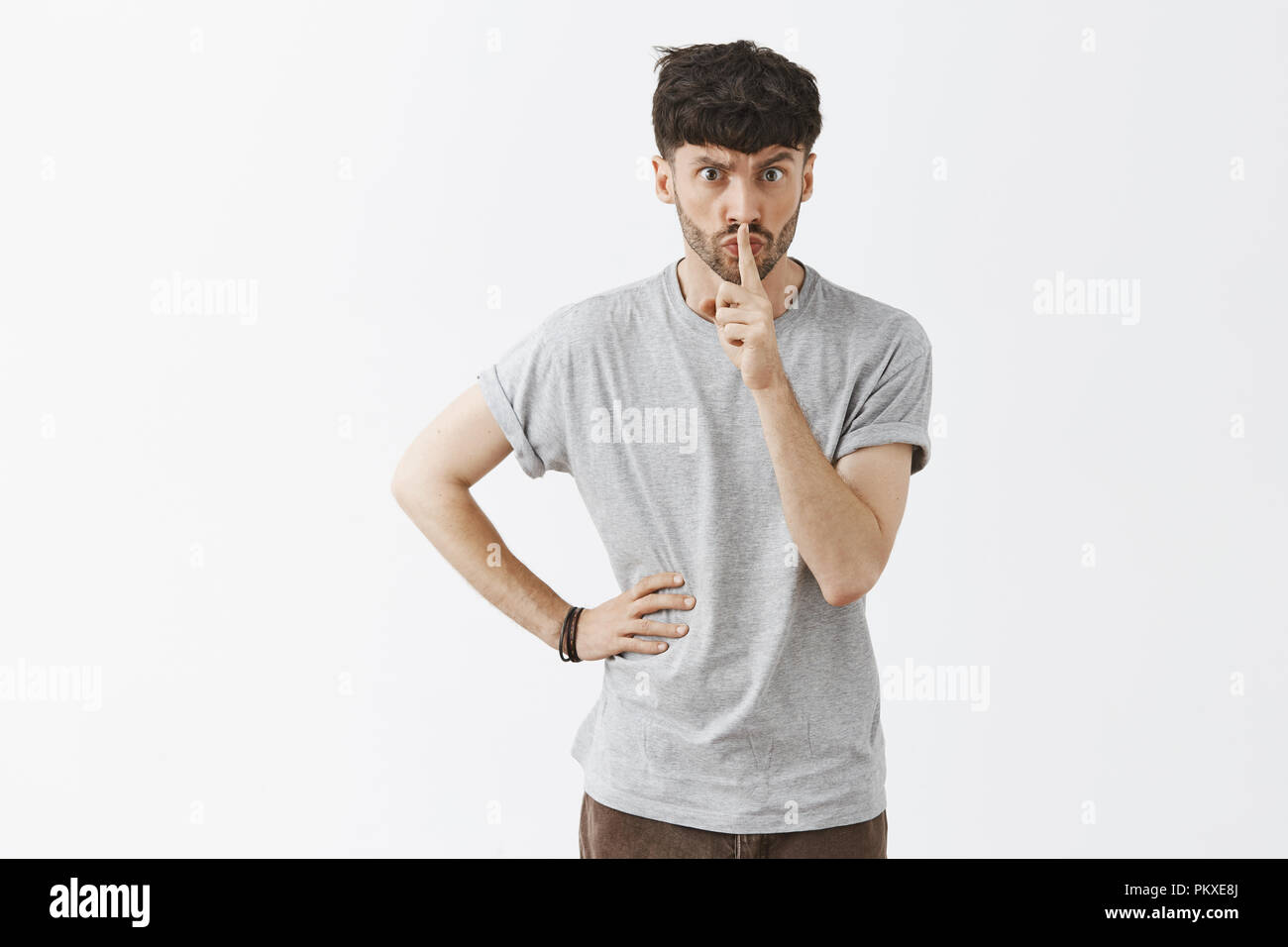 I order you keep quiet. Serious displeased and strict aduly male ...