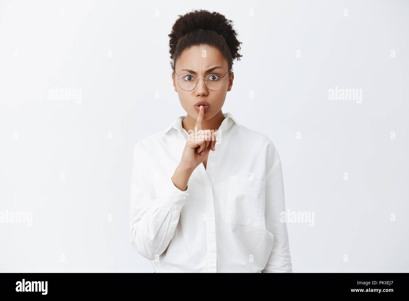 Strict looking woman hi-res stock photography and images - Alamy