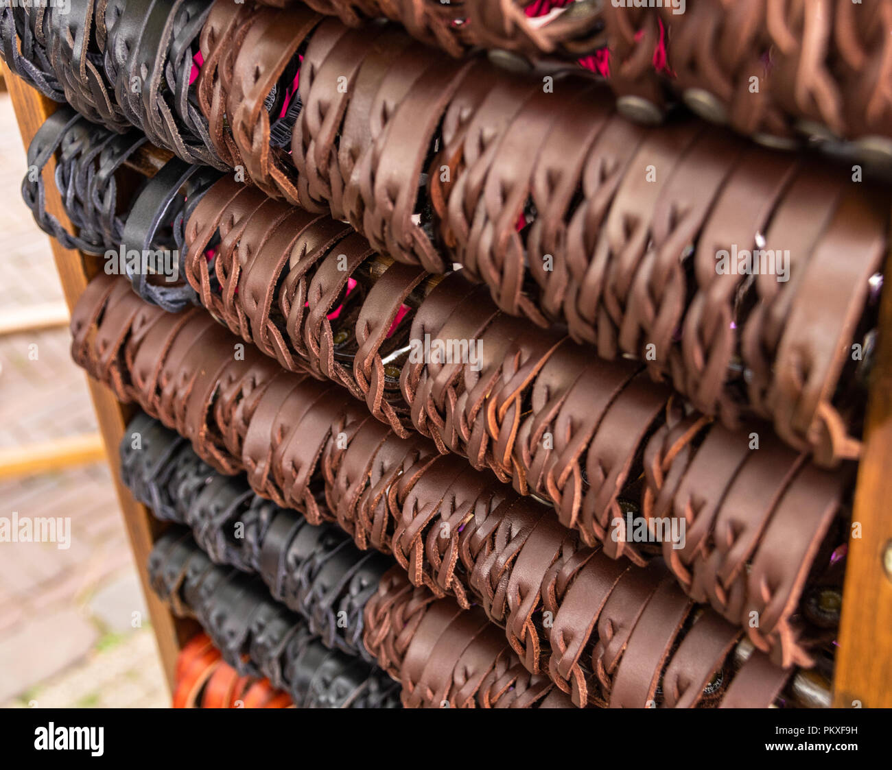 rows of leather bracelets hanging next to each other Stock Photo - Alamy