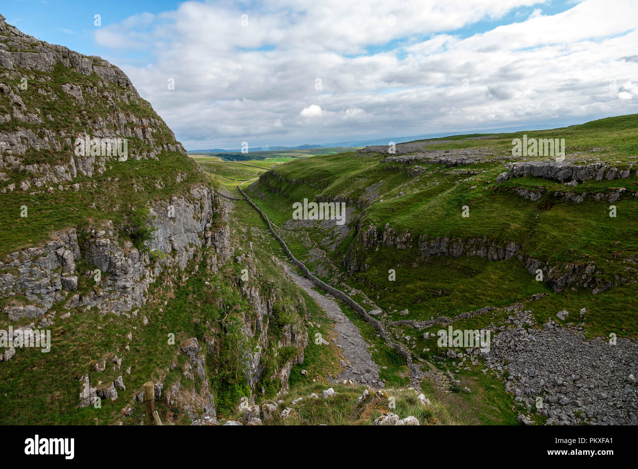 Ing Scar Crag on right at Watlowes Dry Valley Yorkshire between Malham ...