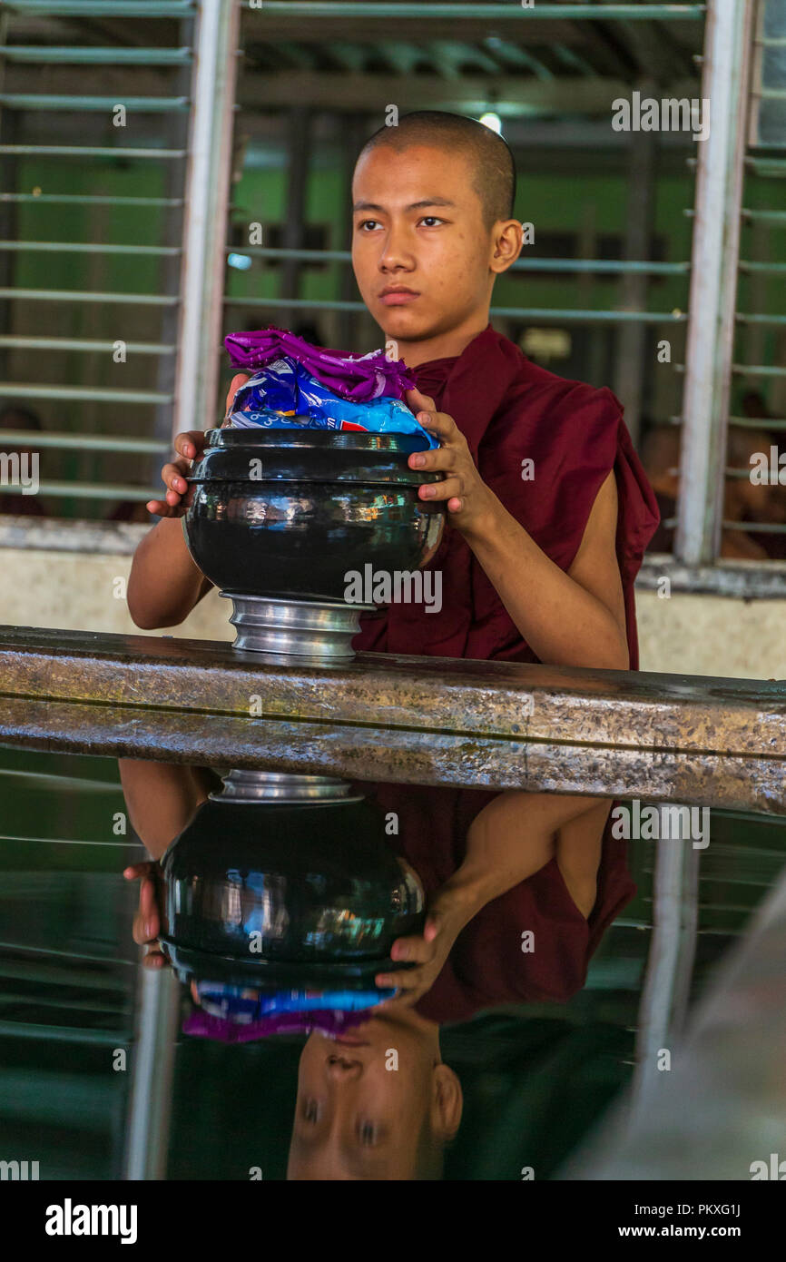Traditional monk feeding in Amarapura, Myanmar Stock Photo - Alamy