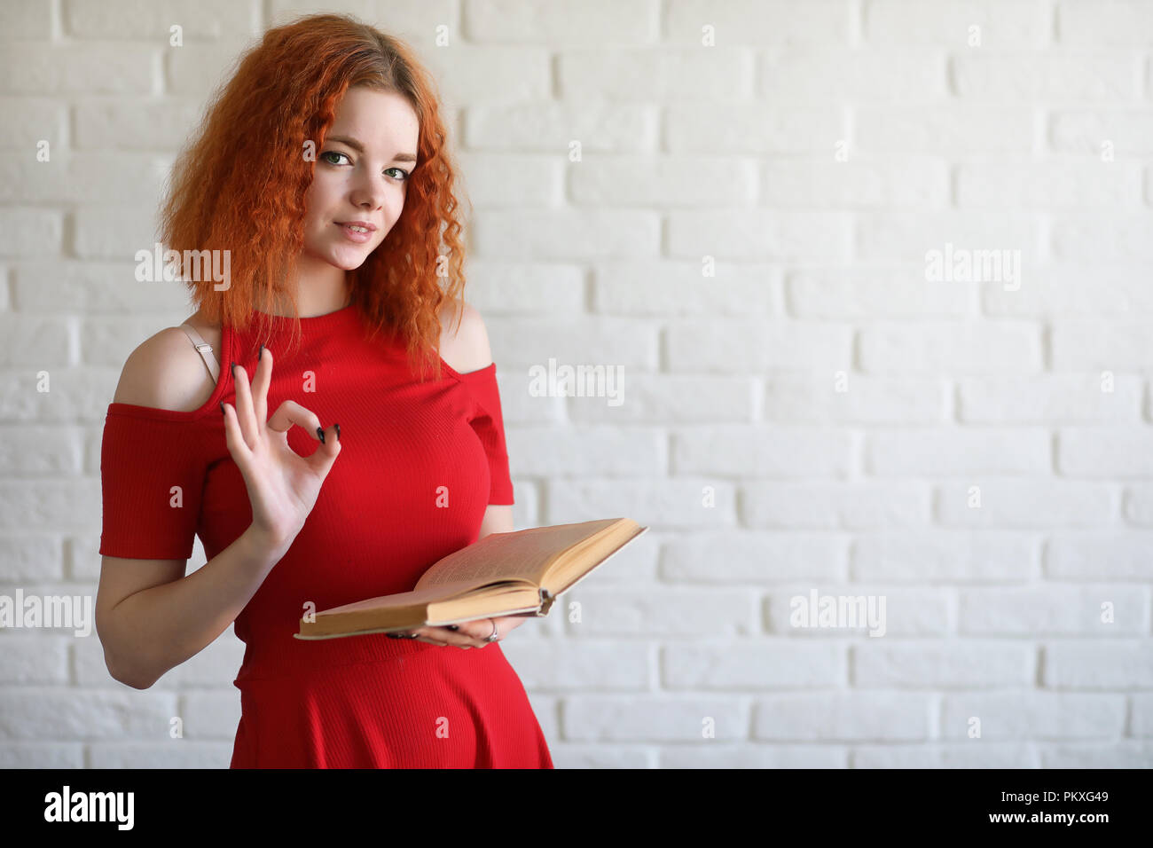 Red-haired girl student Stock Photo - Alamy