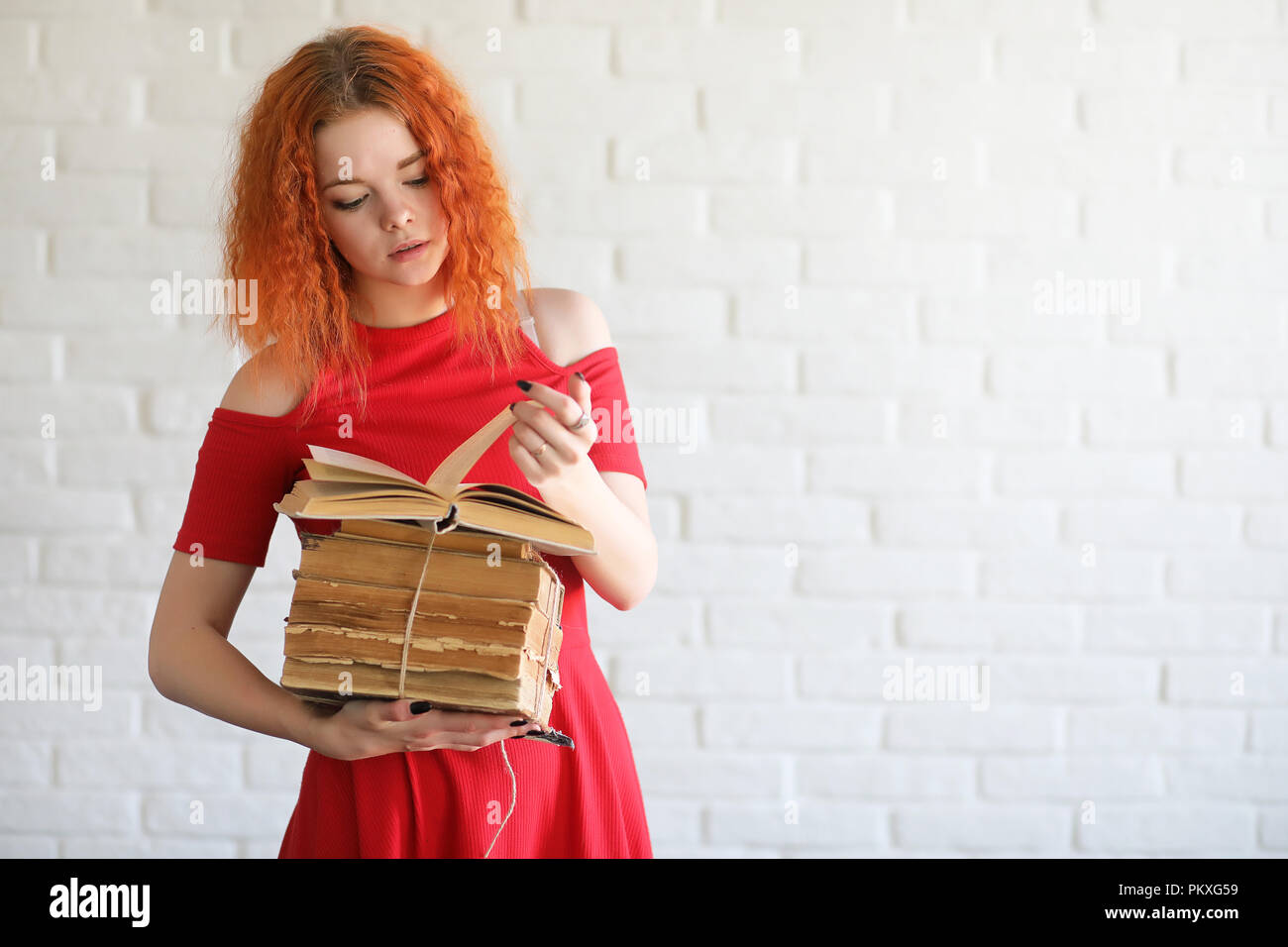 Red-haired girl student Stock Photo - Alamy