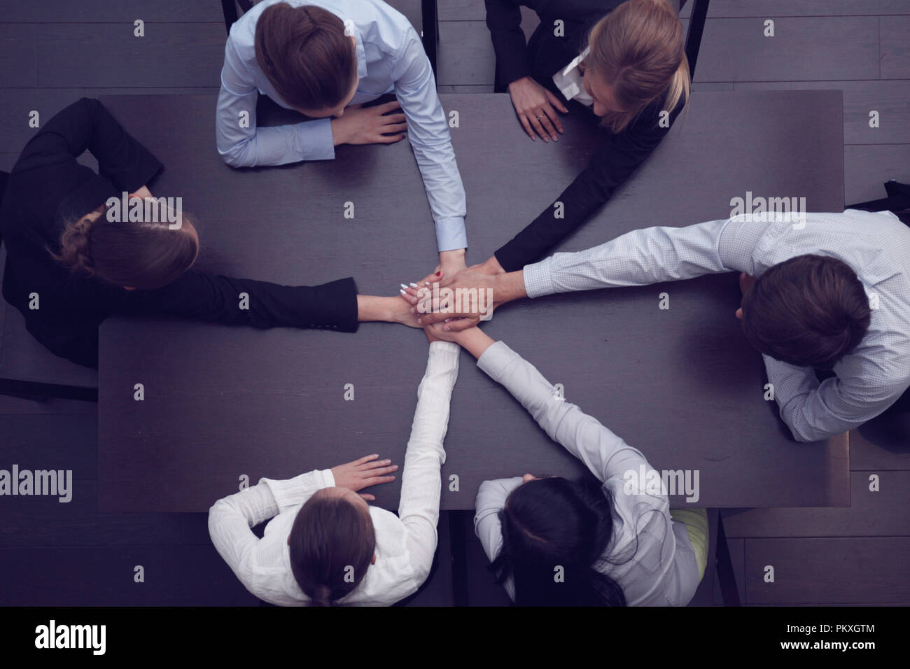 People with their hands together. Business team work concept Stock ...