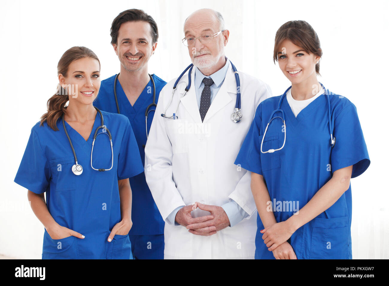 Team of professional doctors isolated on white background Stock Photo ...