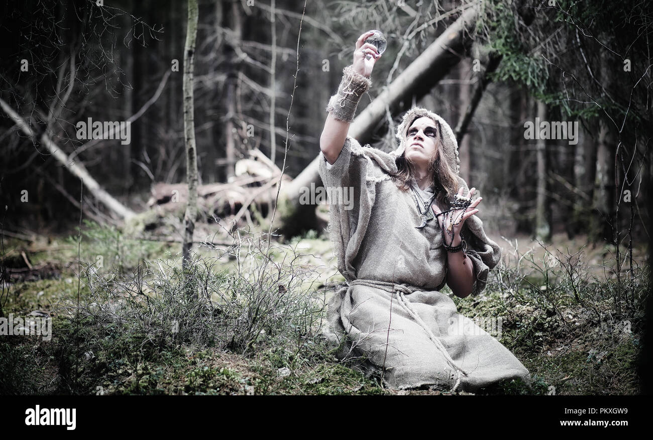 Fairy magician. A sorcerer with a glass sphere, a magical spell Stock ...