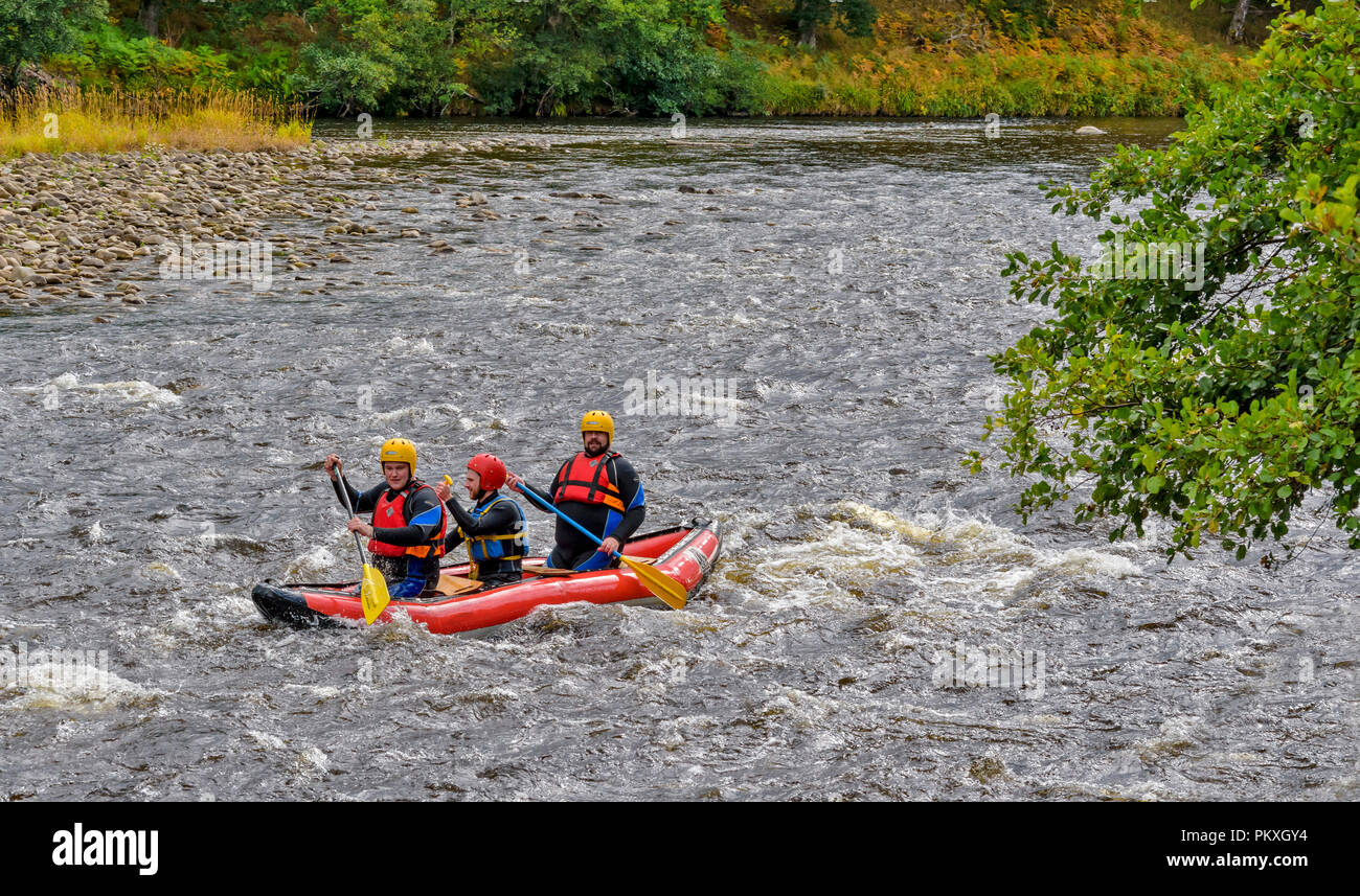 RIVER SPEY SCOTLAND THREE PEOPLE RAFTING WITH CANOE AND INFLATABLE RAFT ...