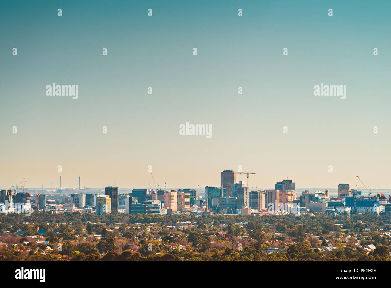 Adelaide city skyline at sunset viewed from the hills Stock Photo - Alamy