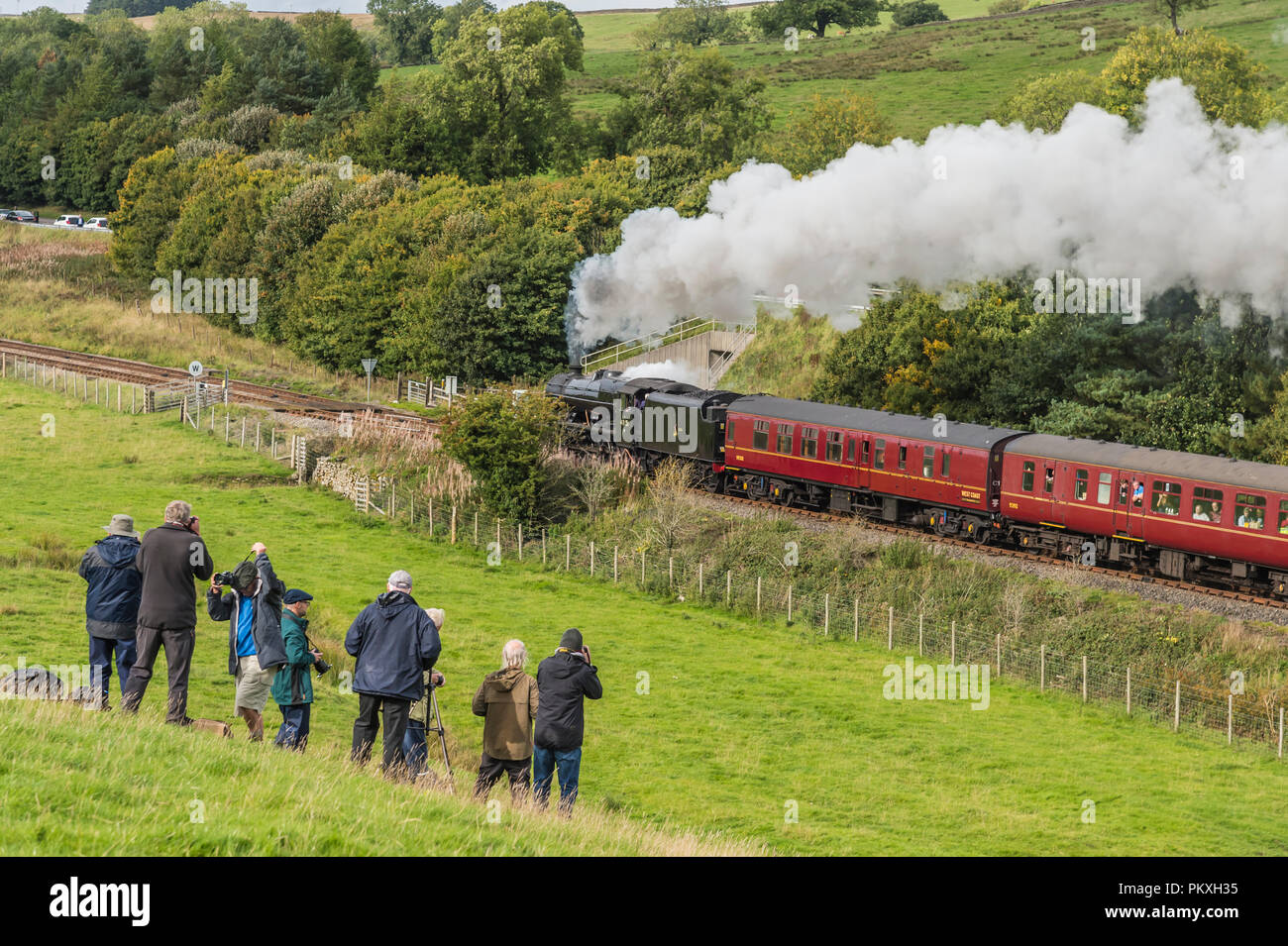Train enthusiasts watch The Brief Encounter nostalgia steam train being ...