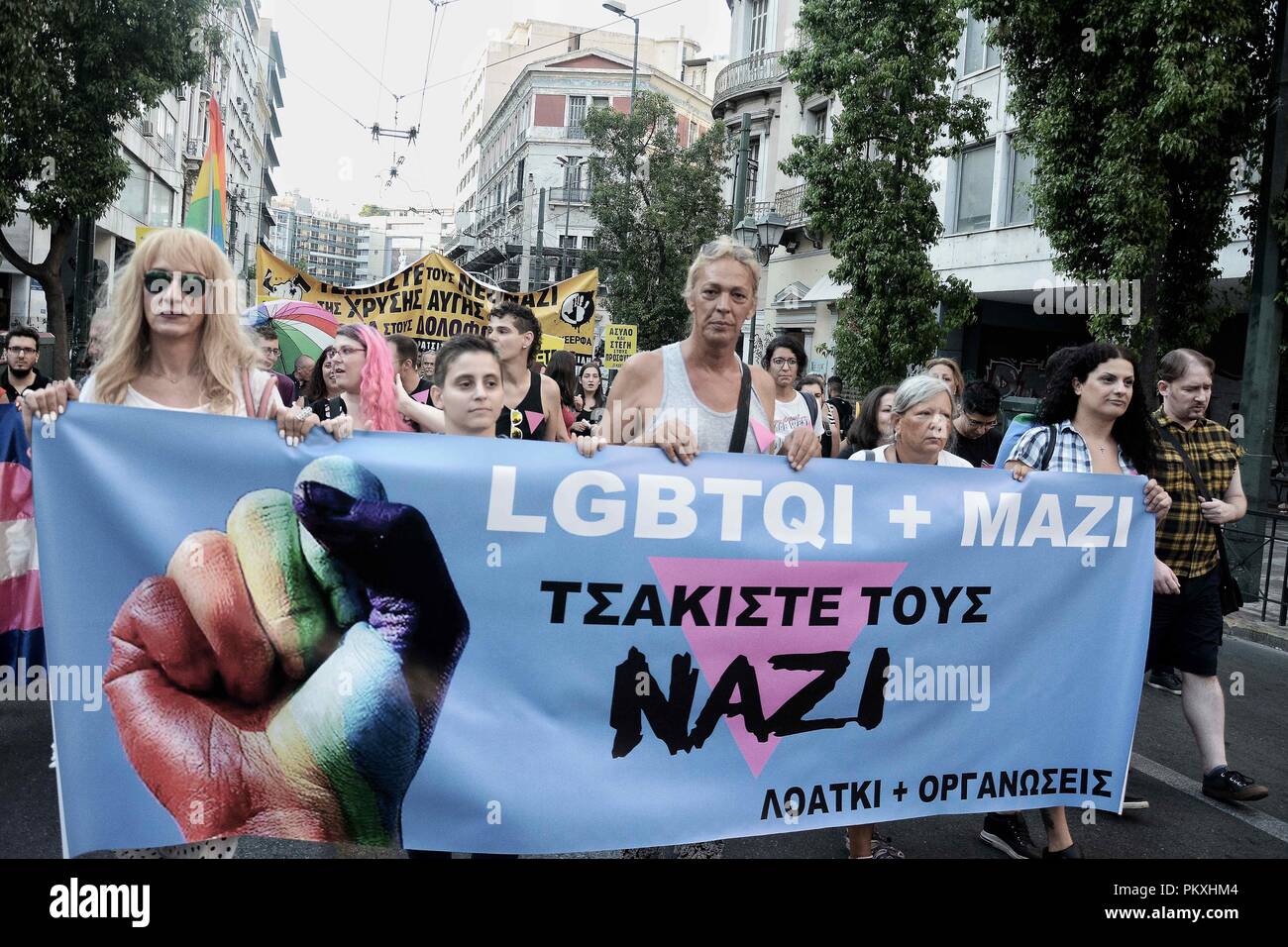 Athens, Greece. 15th Sep, 2018. Protesters seen holding a large banner ...