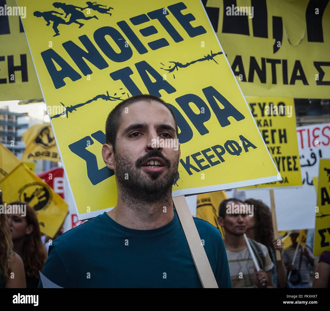Athens, Greece. 15th Sep, 2018. A man seen holding a poster during the ...