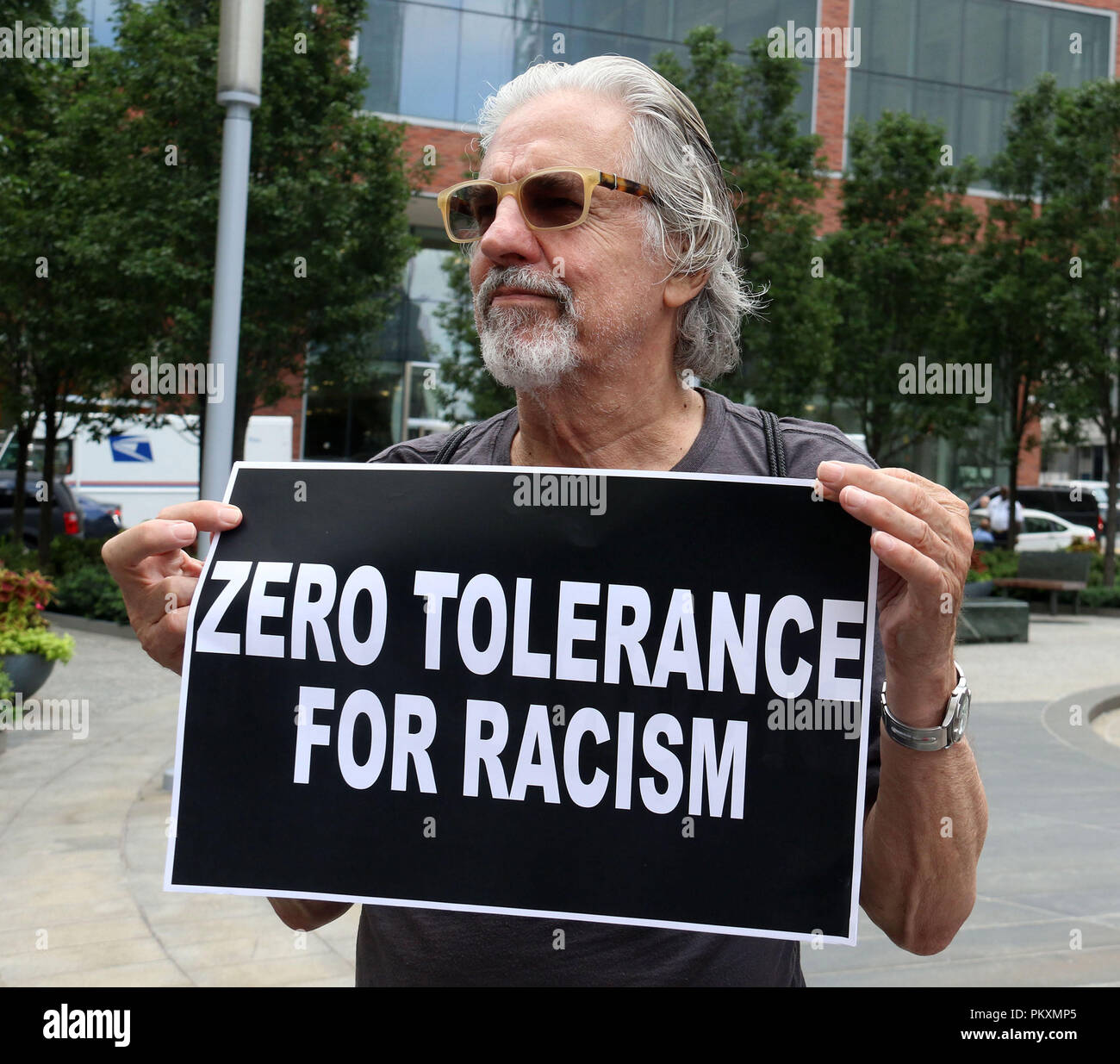 New York City, New York, USA. 15th Sep, 2018. An activist protests ...