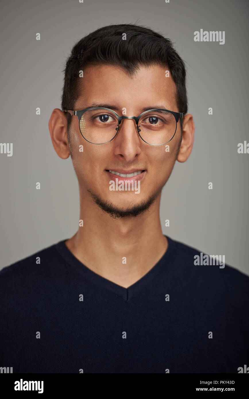 Modern smiling young man close-up portrait headshot Stock Photo - Alamy