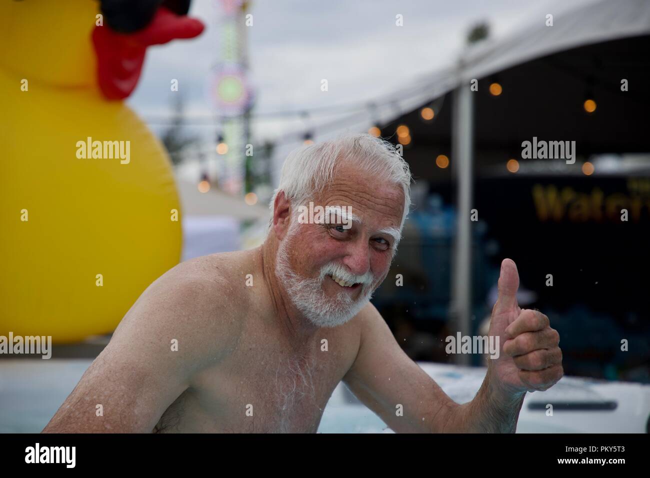 Old Man and Duck Stock Photo - Alamy