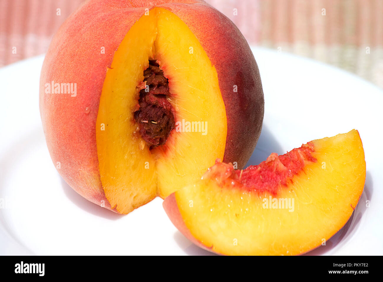 Juicy peach hi-res stock photography and images - Alamy