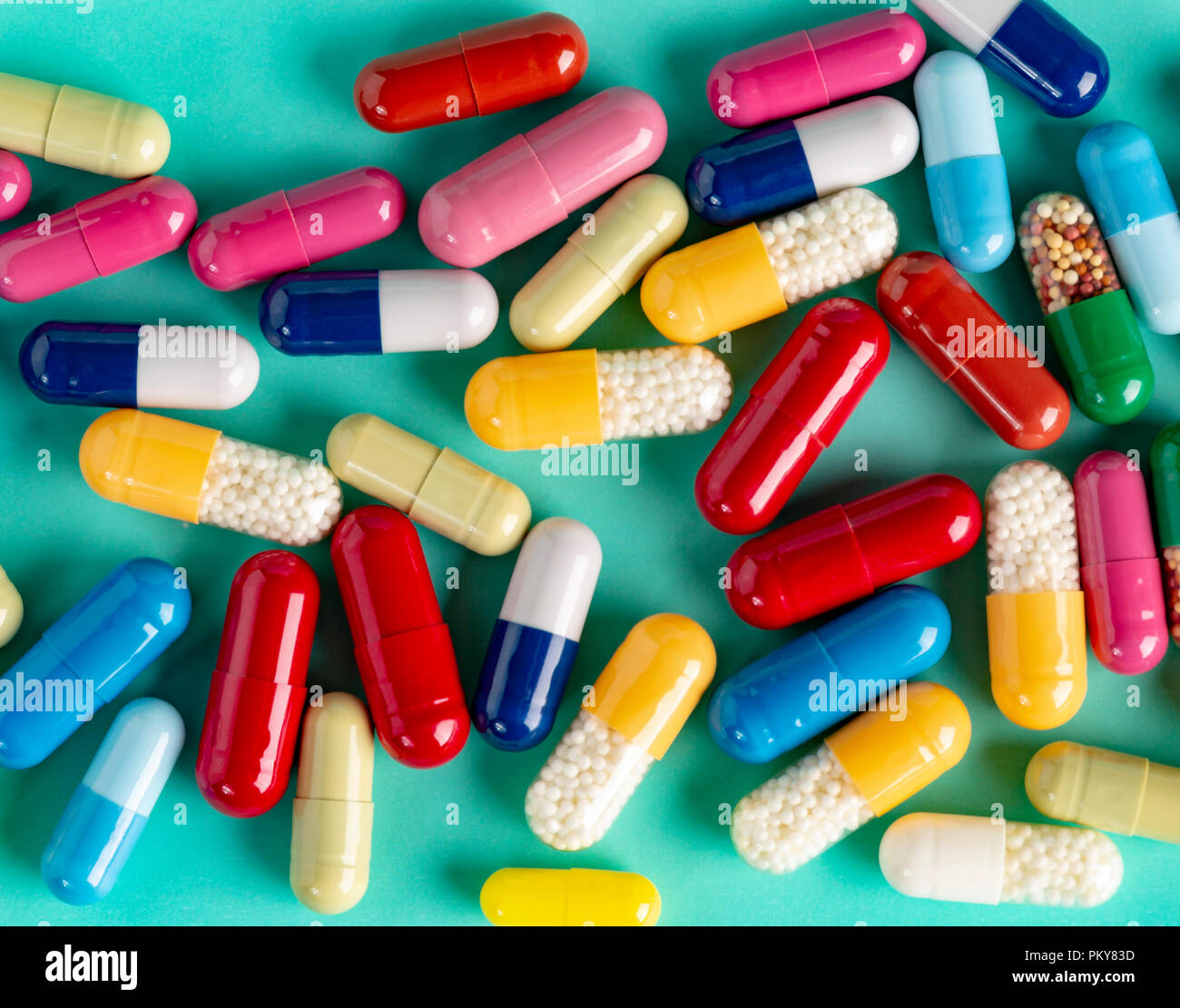 Closeup different medicine capsules and pils Stock Photo - Alamy