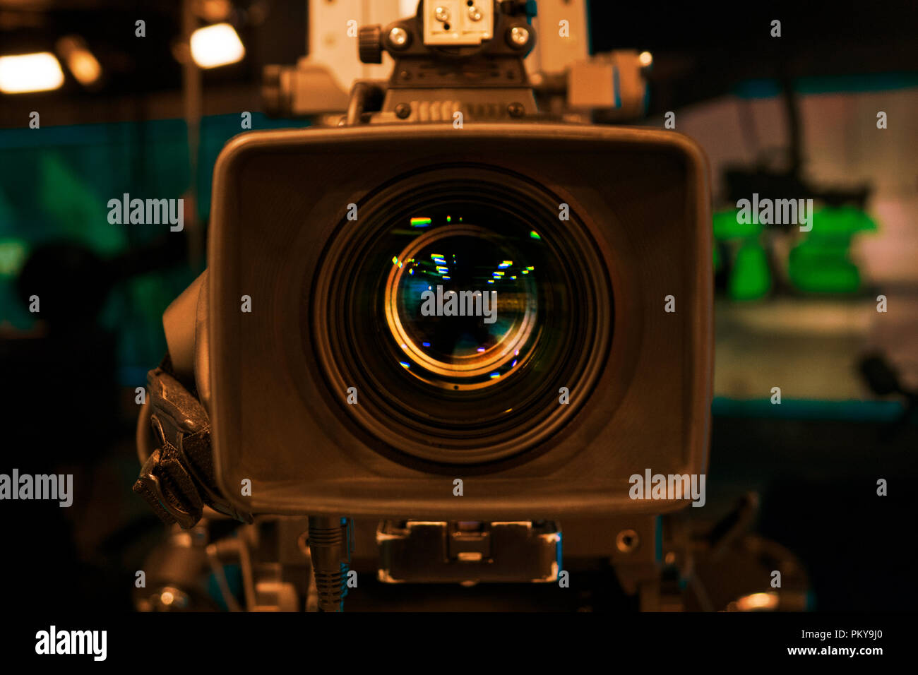 Television Film Camera with focus on the rim of the lens. On Air ...