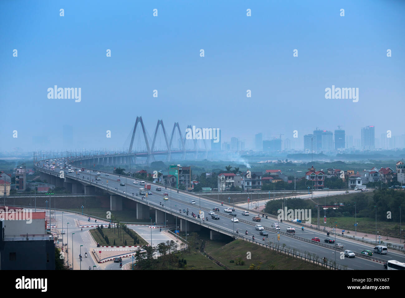 The Nhat Tan Bridge in night Stock Photo - Alamy