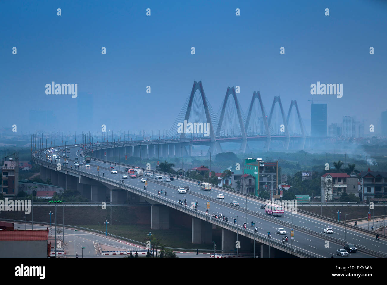 The Nhat Tan Bridge in night Stock Photo - Alamy