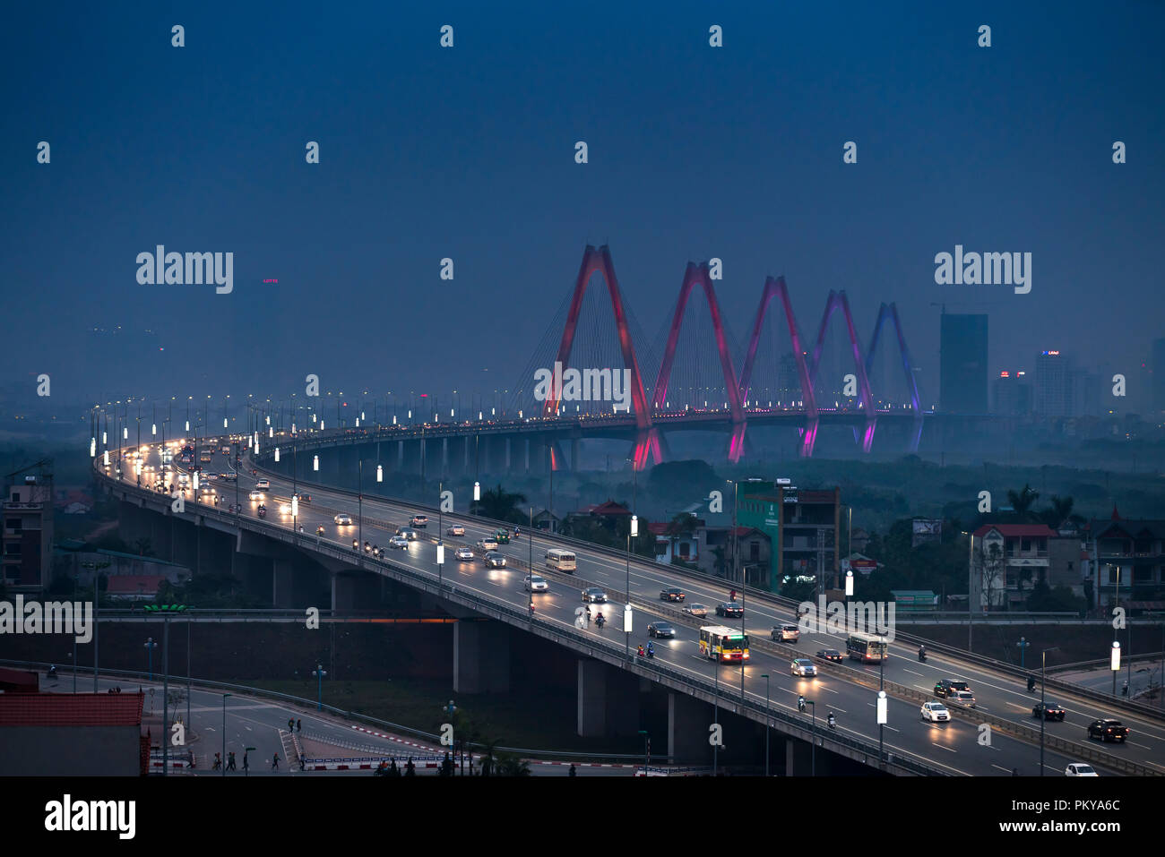 The Nhat Tan Bridge in night Stock Photo - Alamy
