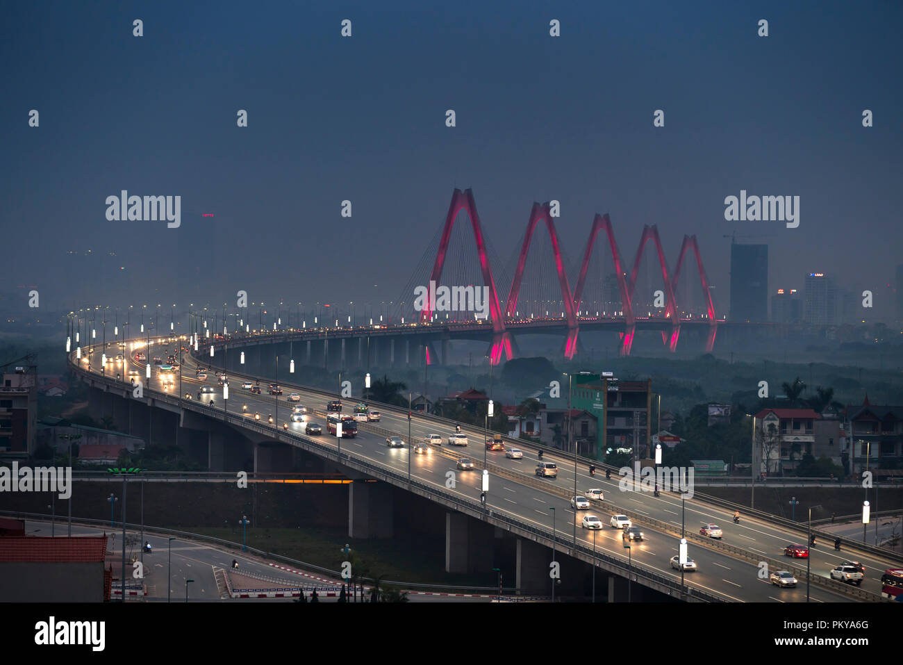 The Nhat Tan Bridge in night Stock Photo - Alamy