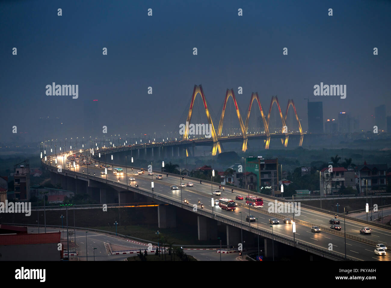 The Nhat Tan Bridge in night Stock Photo - Alamy