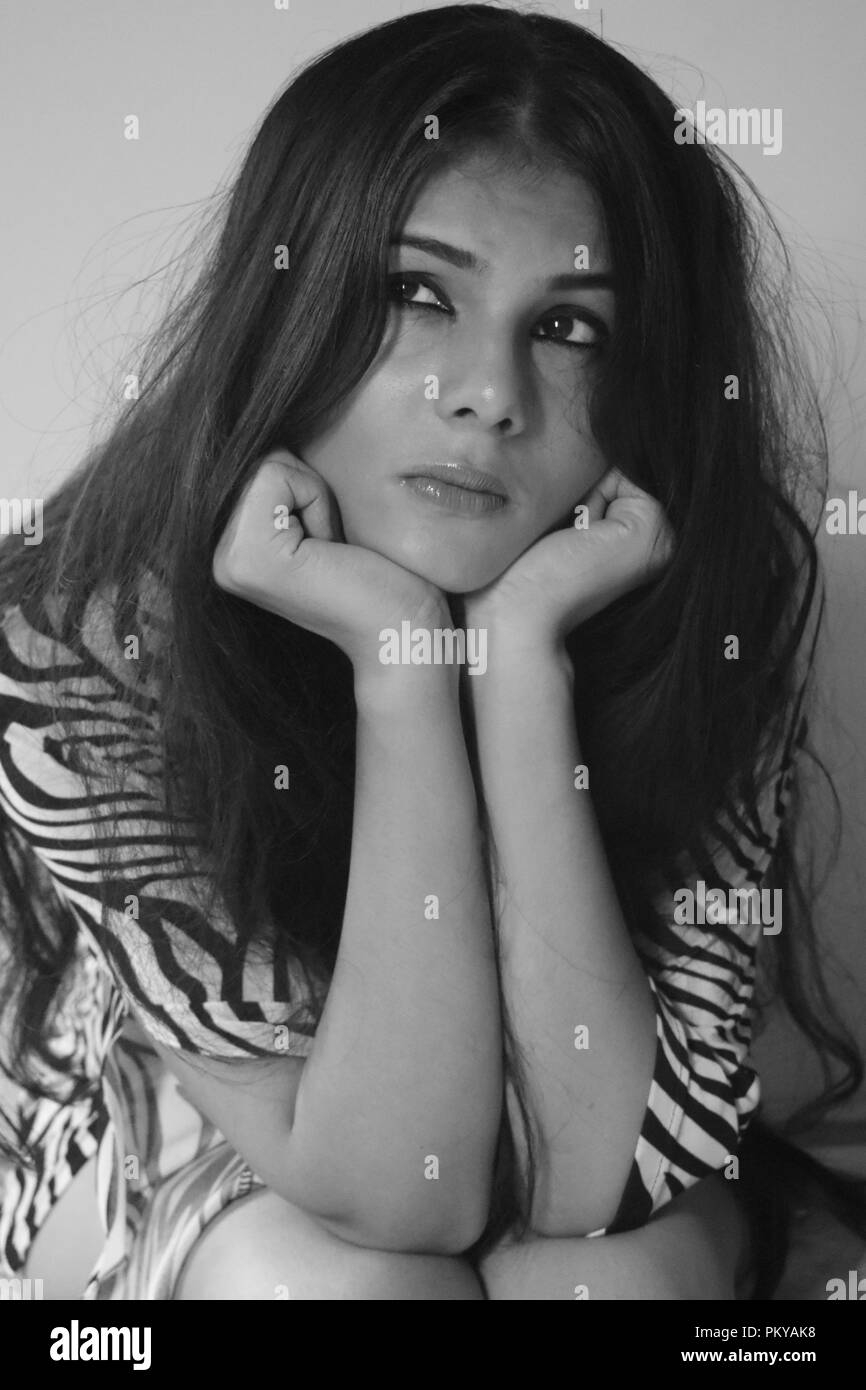 PHOTO OF SAD AND ALONE GIRL Stock Photo - Alamy