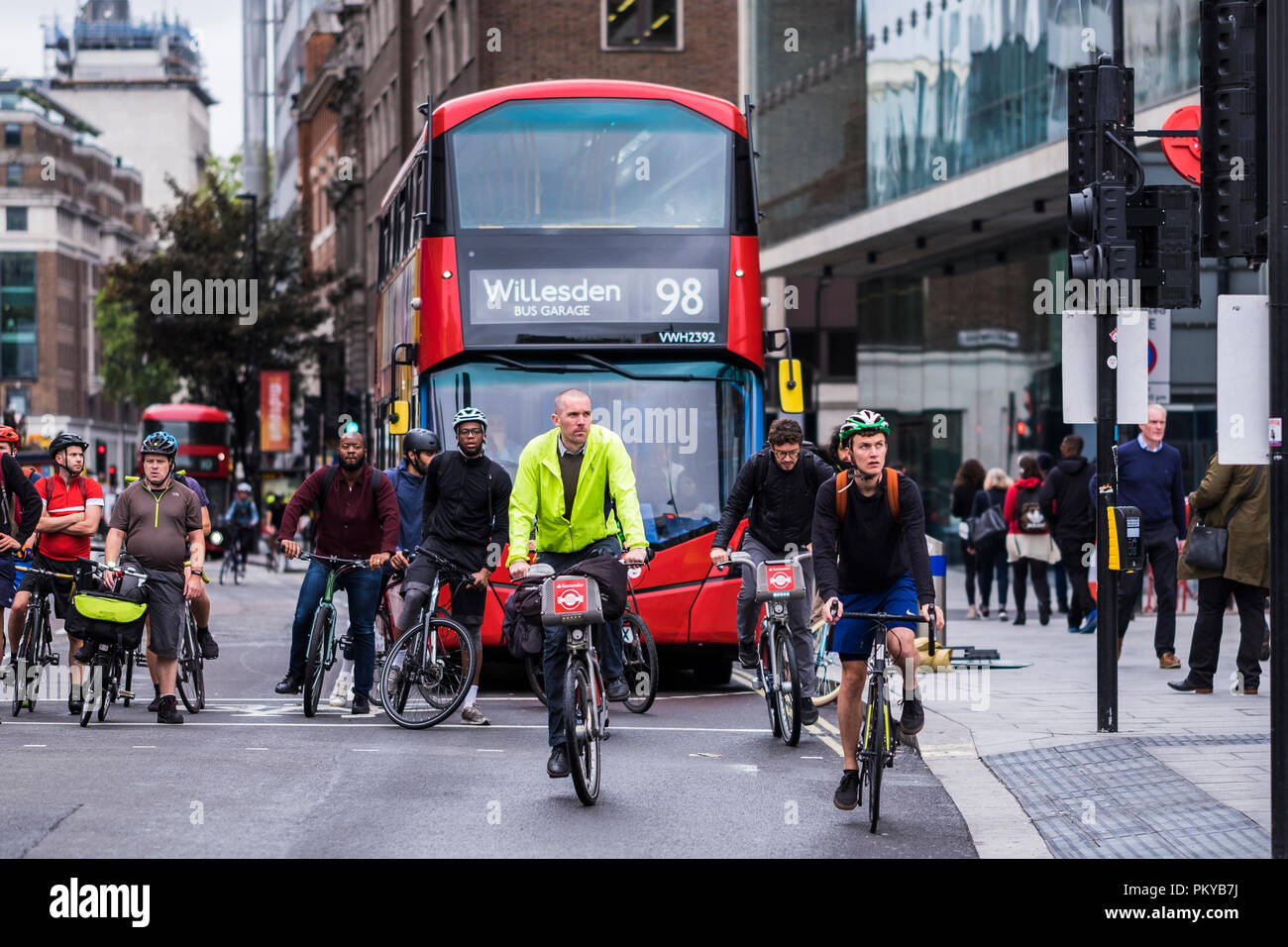 Cyclists on morning commute through central London, England, U.K Stock ...