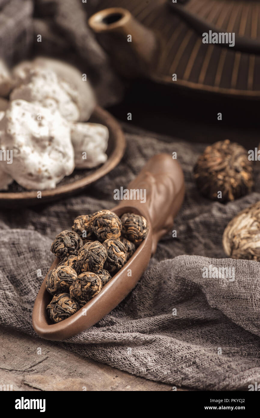 rolled tea leaves into a large pearl. Chinese tea from Yunnan province ...