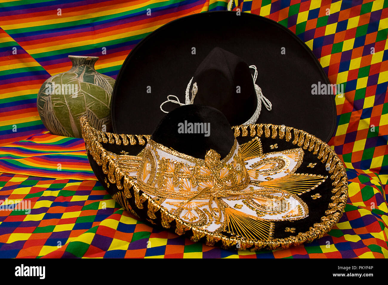 Images of Mexican objects including sombreros, baskets, flowers and ...