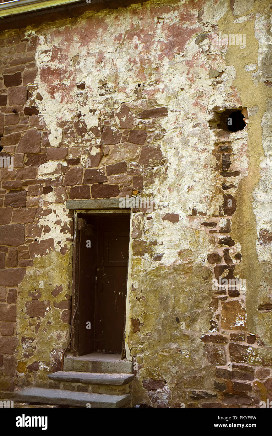 Backside wall of old historic building in New Castle, Delaware with ...