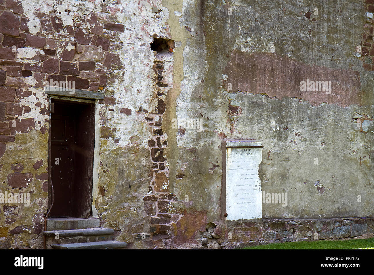 Backside wall of old historic building in New Castle, Delaware with ...