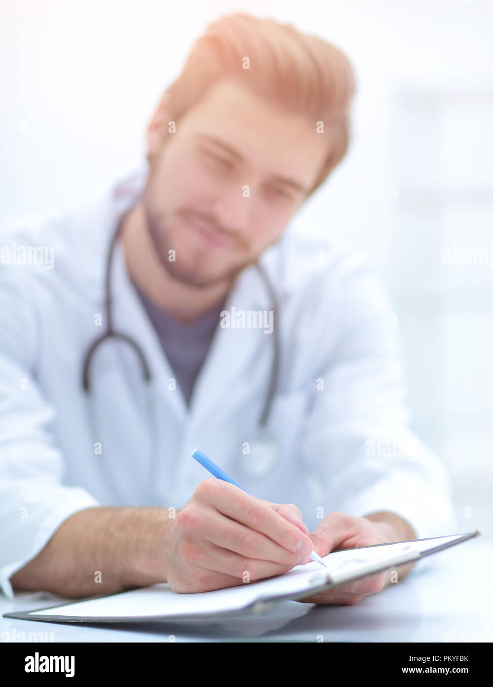 background image of a doctor writing out a prescription Stock Photo - Alamy