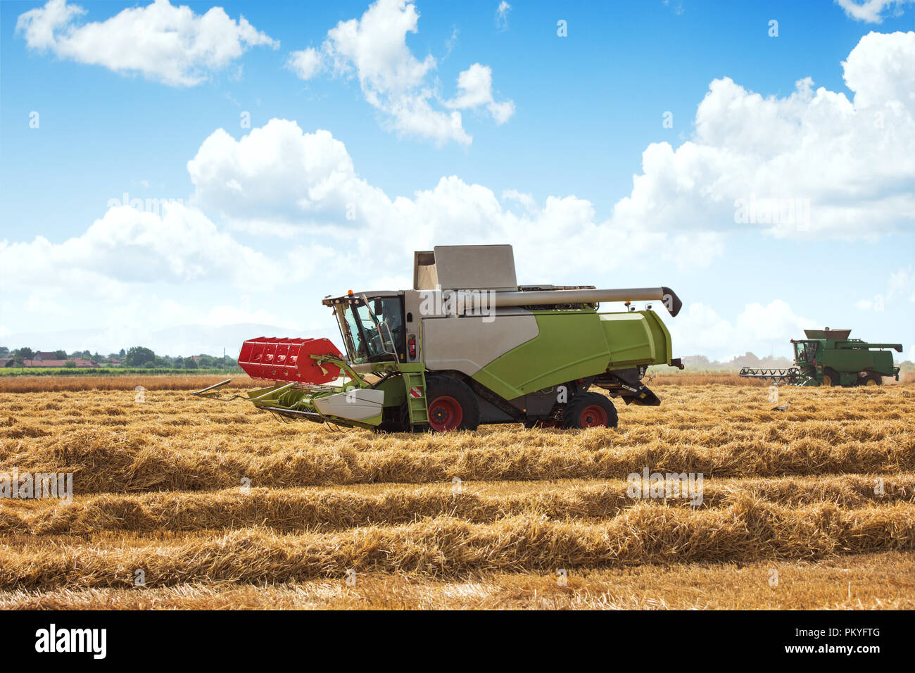 Grain harvester combines on wheat hi-res stock photography and images ...