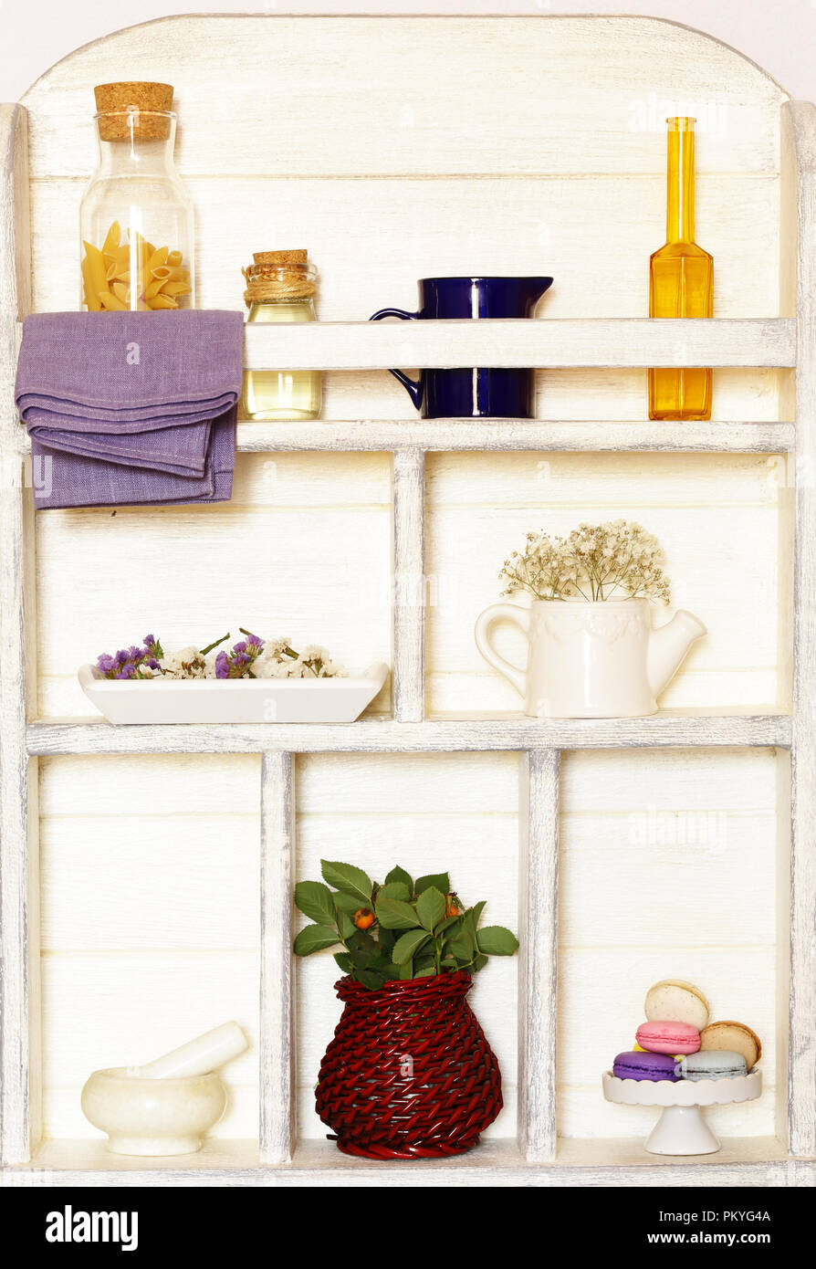 kitchen wooden white cupboard background with utensils and food Stock ...